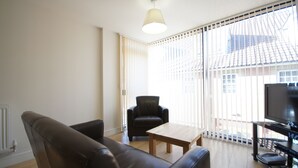 Apartamento, 1 quarto | Cofre no quarto, ferro/tábua de engomar, Wi-fi grátis 