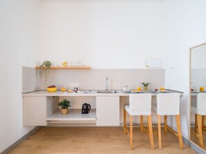 Quarto Duplo Superior | Cozinha privada | Uma chaleira elétrica 