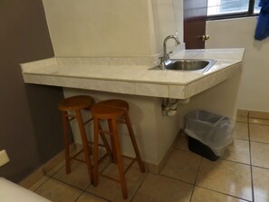 Quarto casal urbano | Cozinha privada