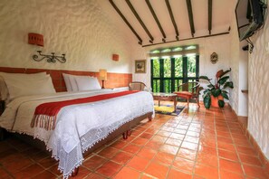 Quarto superior, 1 cama King | Individualmente decorados, escrivaninha, cortinas blackout