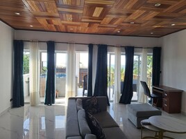 Suíte executiva, suíte, vista parcial para o mar | Lounge