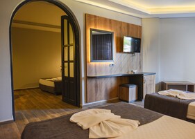 Quarto Familiar | Minibar, com decoração personalizada, quartos insonorizados, Wi-fi