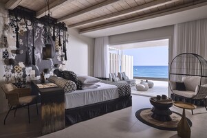 Suite Signature, banheira de hidromassagem grande, vista para o mar | Cofre com capacidade para portátil, quartos insonorizados