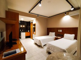 Quarto casal ou duplo premium | Frigobar, escrivaninha, Wi-Fi de cortesia, roupa de cama