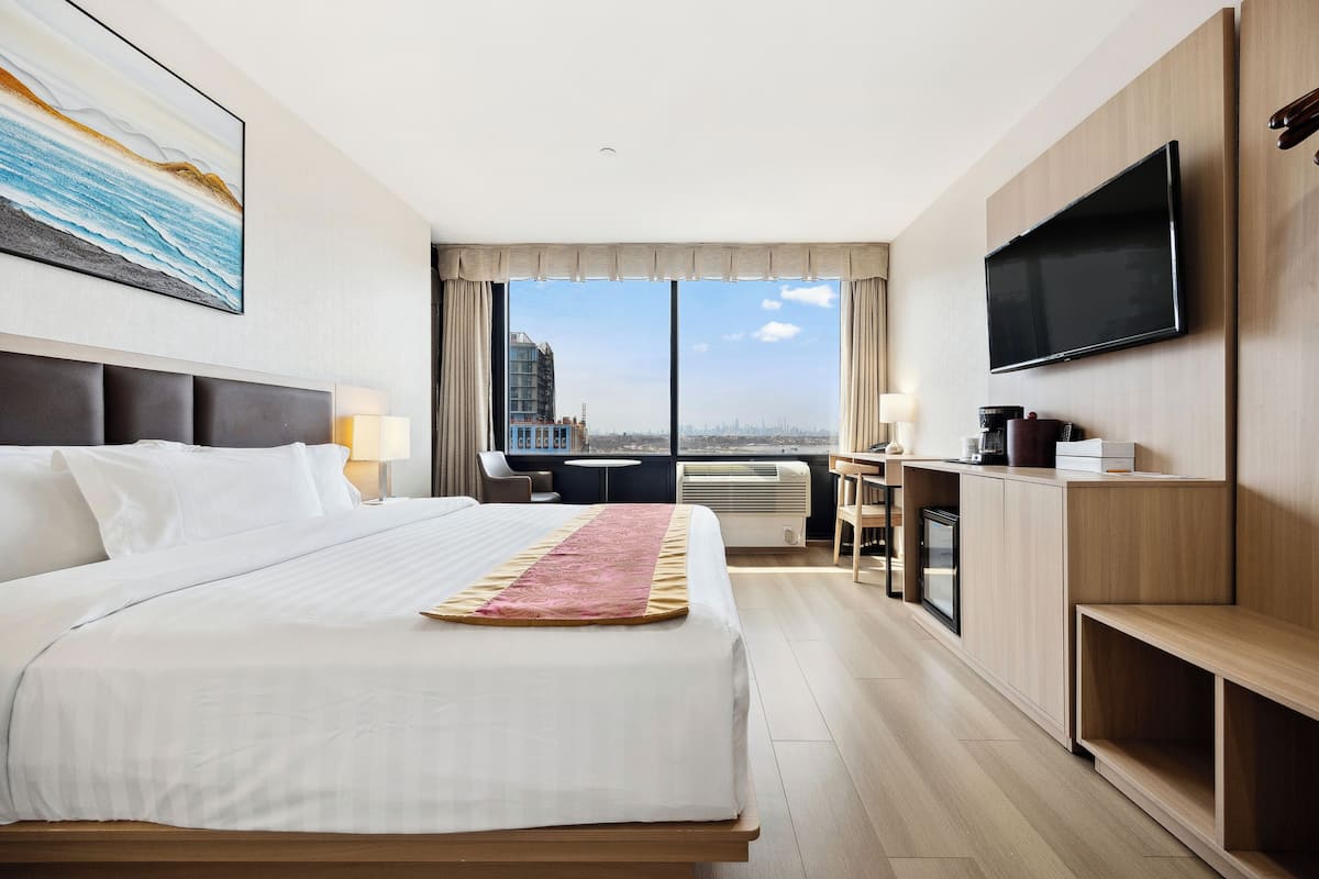 Quarto luxo, 1 cama King, para não fumantes | Escrivaninha, ferros/tábuas de passar roupa