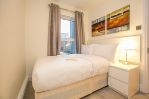 Apartamento, 2 Quartos | Cofre no quarto, quartos insonorizados, ferro/tábua de engomar