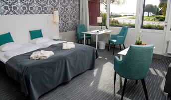 Suite Júnior | Minibar, secretária, Wi-fi grátis, roupa de cama fornecida 