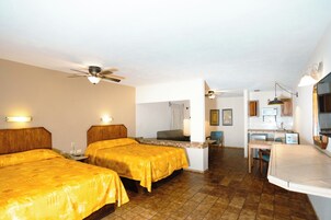 Suíte executiva | Cortinas blackout, ferros/tábuas de passar roupa, Wi-Fi de cortesia