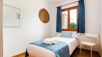 Apartamento, 2 quartos, terraço | Cortinas blackout, berços (sobretaxa), Wi-Fi de cortesia, roupa de cama