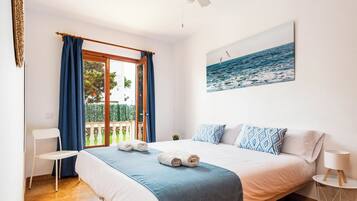 Apartamento, 2 quartos, terraço | Cortinas/cortinados opacos, berços/camas para crianças, Wi-fi grátis