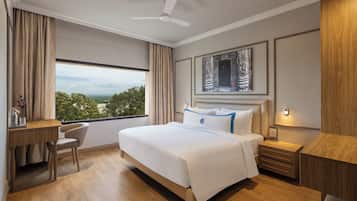 Minibar, cofre no quarto, quartos insonorizados, ferro/tábua de engomar