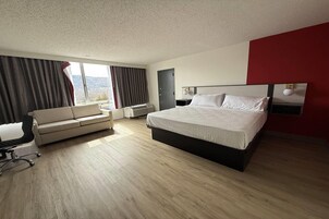 Suite, 1 cama king-size, não fumadores | Ferro/tábua de engomar, Wi-fi grátis 