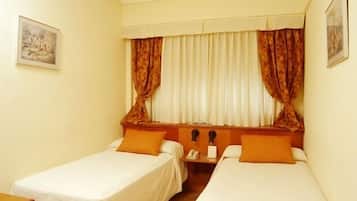 Minibar, cofre no quarto, secretária, berços/camas para crianças grátis