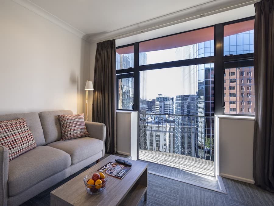 Apartamento, 1 quarto | Sala de estar | Televisor