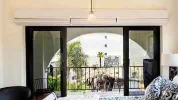Suíte superior, várias camas, cozinha americana | Vista do quarto