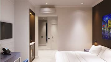 Quarto Económico | Minibar, secretária, Wi-fi grátis, roupa de cama fornecida