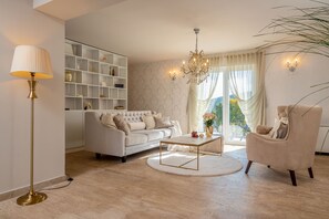 Villa Exclusiva | Sala de estar | TV de ecrã plano 