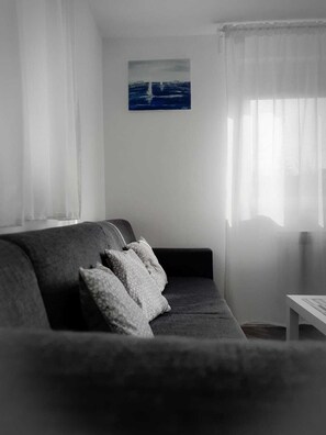 Apartamento, 1 cama queen-size e sofá-cama | Sala