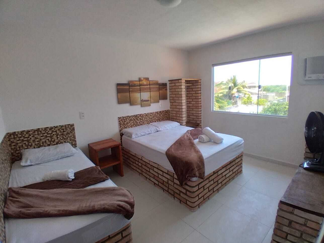 Duplex família, várias camas, vista para a praia | Individualmente decorados, individualmente mobiliados