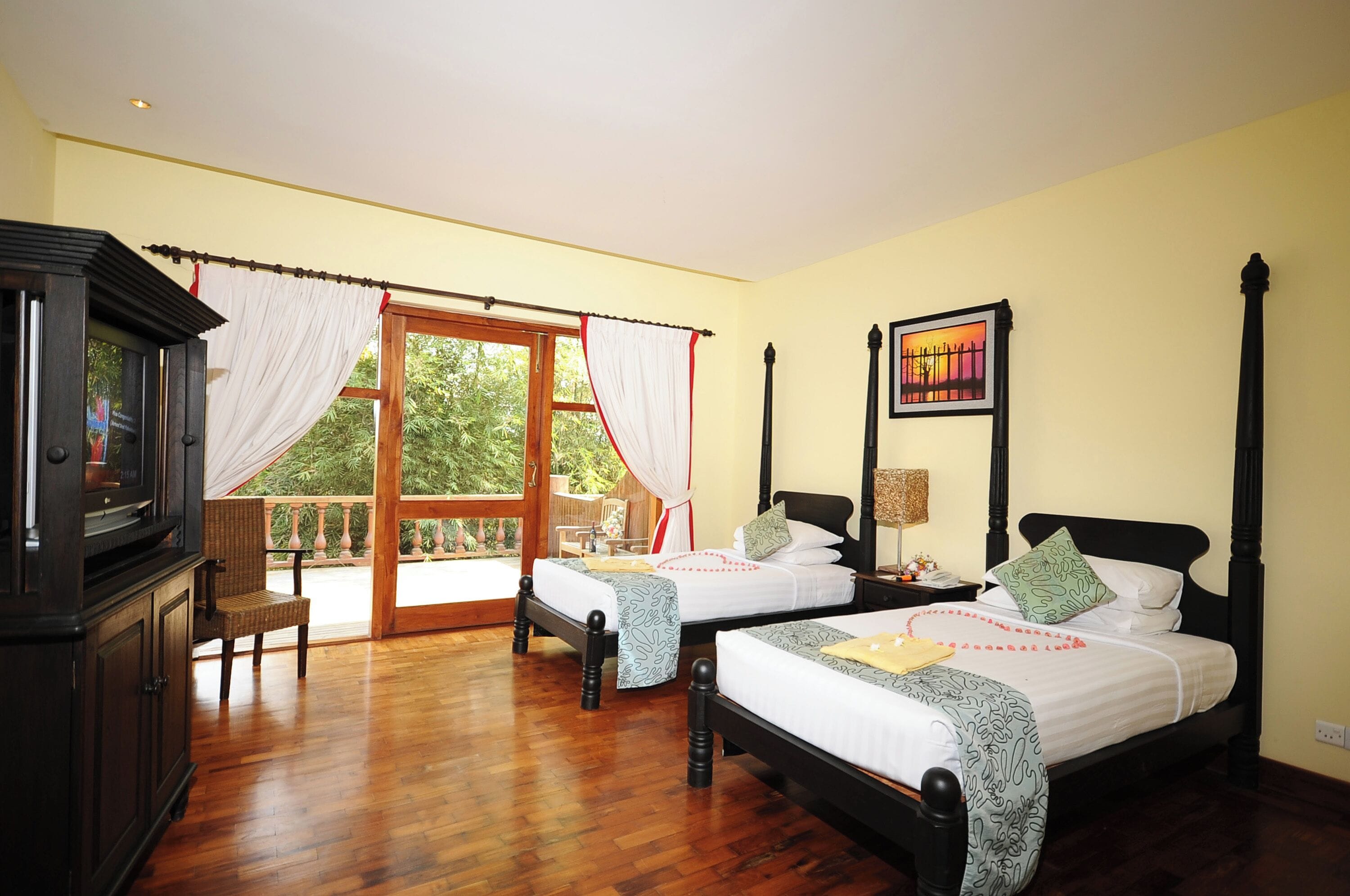 Quarto Duplo ou Twin Superior | Minibar, cofre no quarto, secretária, ferro/tábua de engomar 