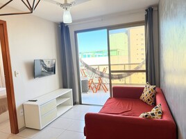 Apartamento | Sala de estar | Televisor