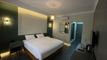 Roupas de cama premium, frigobar, cofres nos quartos, Wi-Fi de cortesia