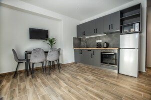Apartamento superior | Opções para refeição no quarto
