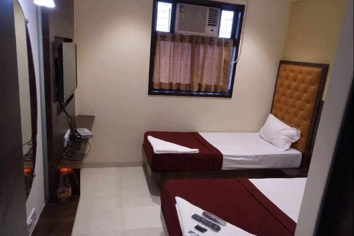 Quarto Twin Deluxe | Cortinas/cortinados opacos, Wi-fi grátis, roupa de cama fornecida