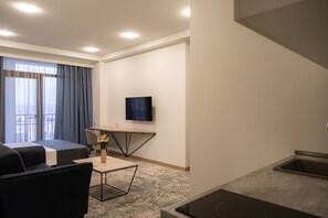 Apartamento família | Roupas de cama premium, edredons de pluma