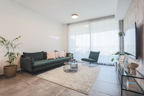 Apartamento Exclusivo, varanda | Sala | TV de ecrã plano, Netflix, serviços de streaming 