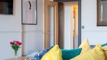 Apartamento, várias camas | Sala de estar