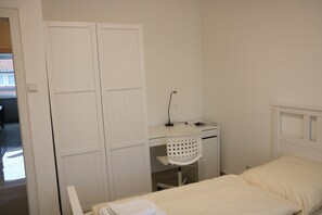 Apartamento Empresarial, Vista para a cidade | 3 quartos, Wi-fi grátis 