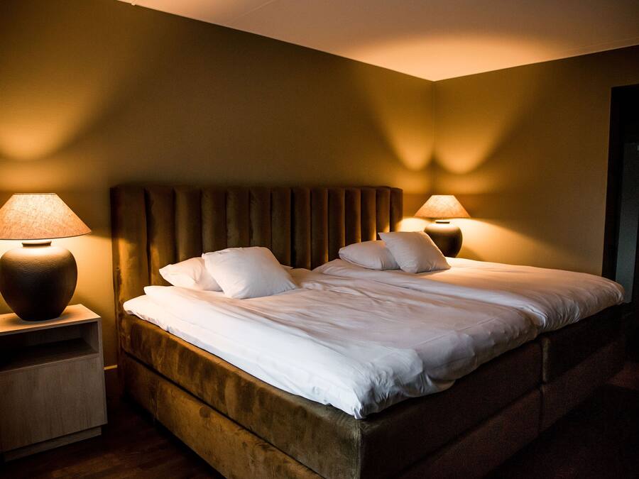 Roupas de cama premium, cofres nos quartos, berços (sobretaxa)