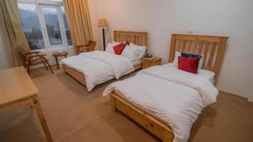 Quarto triplo luxo, vista para a montanha | Wi-Fi de cortesia, roupa de cama