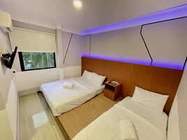 Quarto Triplo Deluxe | Ferro/tábua de engomar, Wi-fi grátis, roupa de cama fornecida 