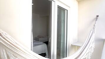 Quarto triplo luxo, 2 quartos | Sacada