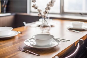 Apartamento, 3 quartos | Sala de jantar