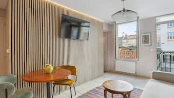 Apartamento Familiar | Sala de estar | Smart TV de 55 cm com canais digitais, televisor