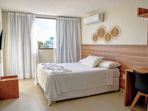 Apartamento família, 3 quartos | Frigobar, Wi-Fi de cortesia, roupa de cama