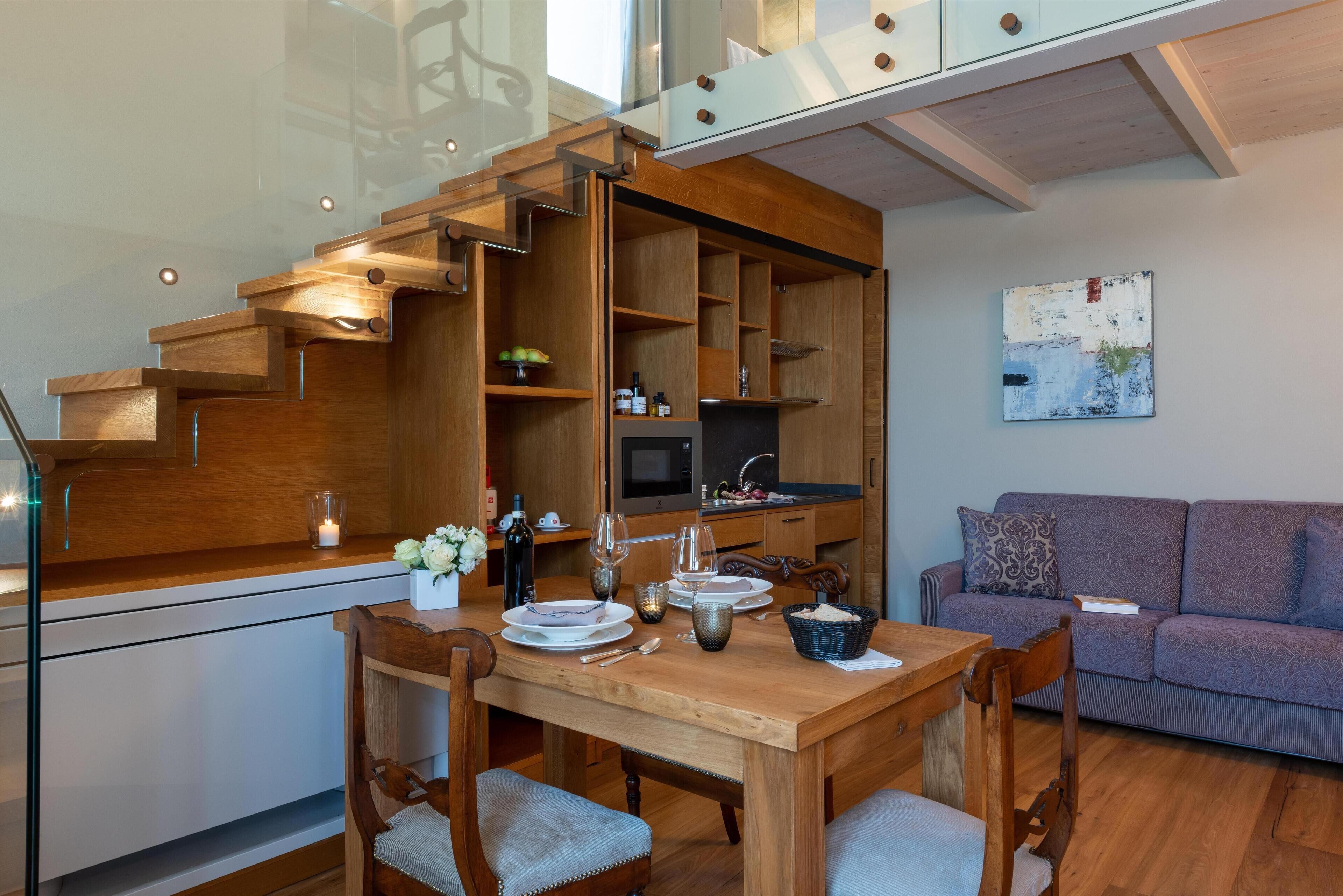 Loft San Michele | Roupas de cama antialérgicas, frigobar (abastecido com itens grátis)