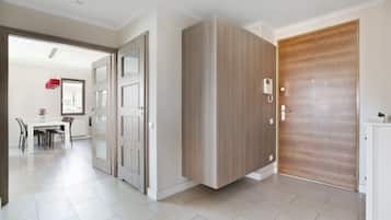 Apartamento Comfort | Sala de estar | Televisor