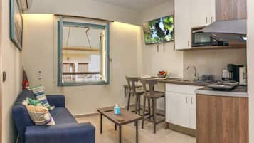 Apartamento Clássico | Sala de estar | Smart TV de 43 de polegadas com canais via satélite, televisor, Netflix