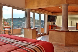 Suíte estúdio luxo (Cadbury) | Banheiro | Chuveiro, secador de cabelo, chinelos, toalhas de banho