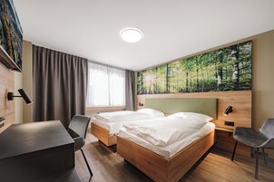 Edredons de pluma, cofres nos quartos, Wi-Fi de cortesia, roupa de cama