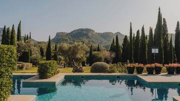 Quarto (Pool Cottage Suite) | Terraço/pátio