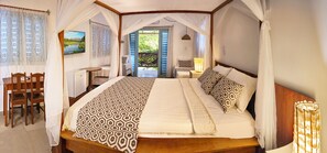 Quarto Deluxe | Minibar, cofre no quarto, secretária, Wi-fi grátis