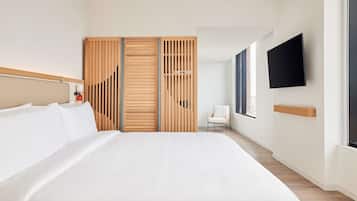 Quarto, 1 cama King, no canto | Frigobar, cofres nos quartos, quartos à prova de som, Wi-Fi de cortesia