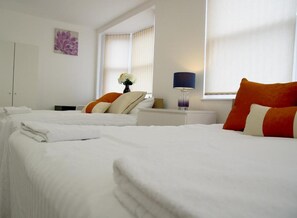 Apartamento | 2 quartos, Wi-Fi de cortesia, roupa de cama