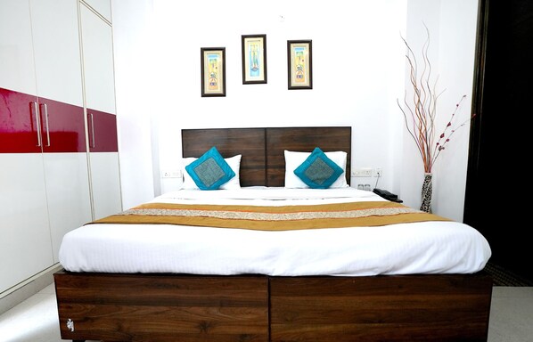 Quarto luxo | Wi-Fi de cortesia, roupa de cama