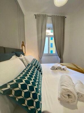 Apartamento Familiar | 2 quartos, edredões de penas 